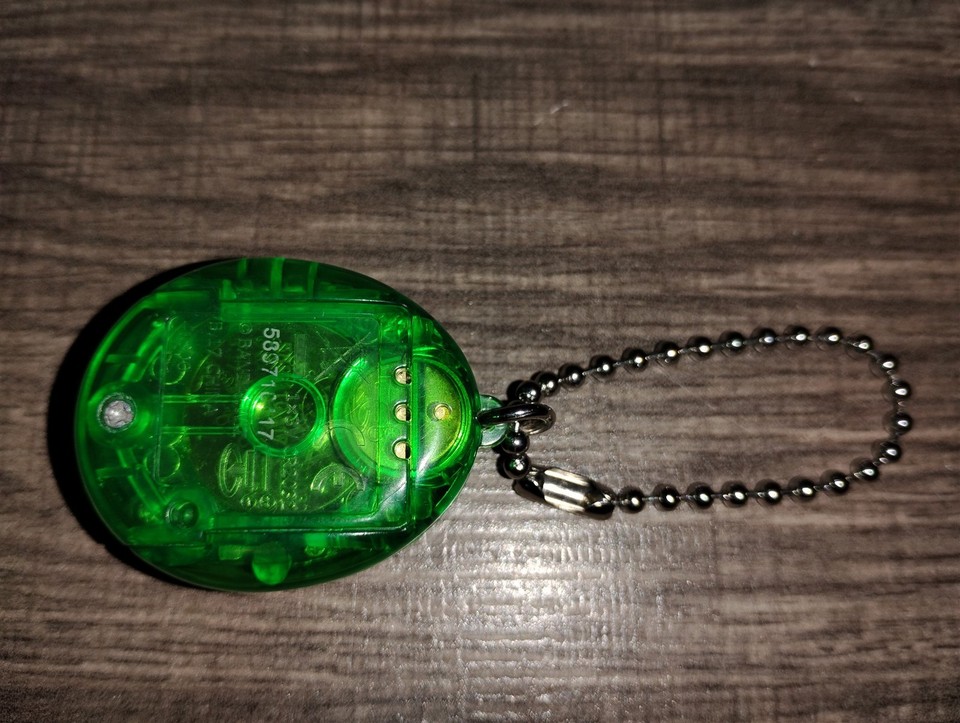 Genuine Tamagotchi Mini Bandai Virtual Pet Game Translucent Green ...