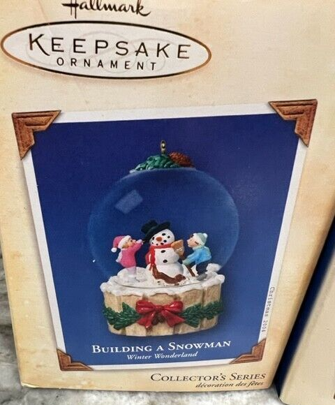 Hallmark Keepsake Ornament Building A Snowman And Bringing Home the ...