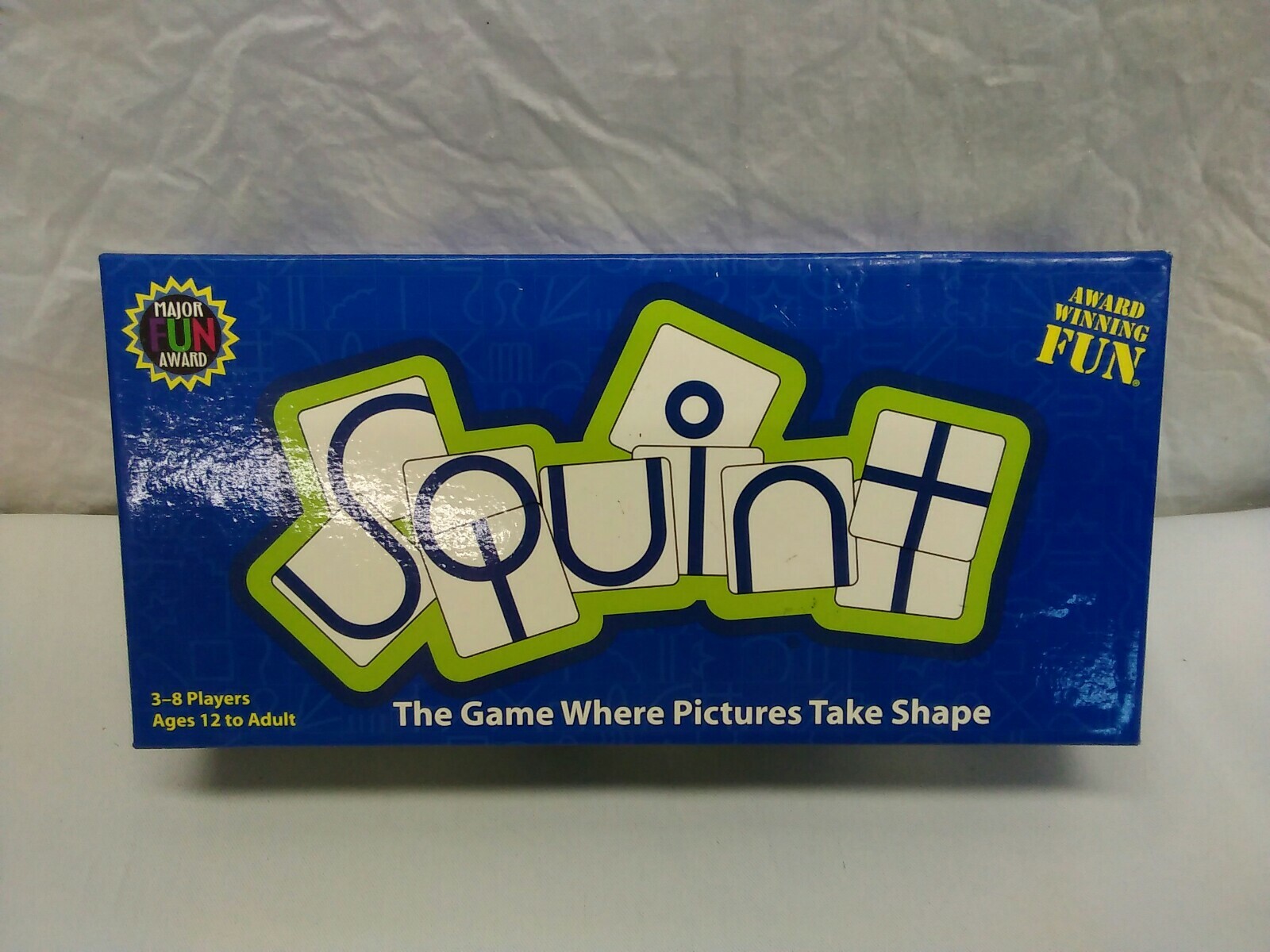 SQUINT THE GAME WHERE PICTURES TAKE SHAPE - OUT OF THE BOX PUBLISHING ...