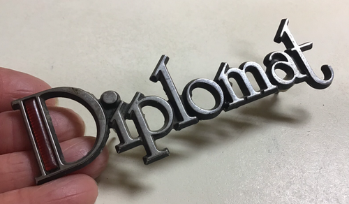 1977 -1980 DODGE DIPLOMAT SCRIPT EMBLEM METAL MOPAR 4017344 | eBay