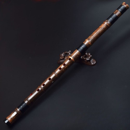A purple bamboo flute, which is an eight-hole musical instrument. | eBay