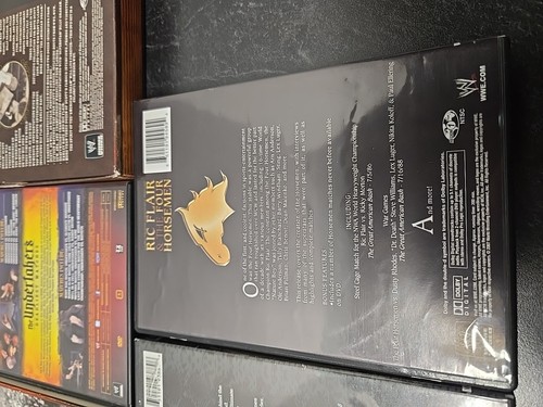 WWE DVD Lot Of 7 Hulk Hogan Undertaker Ric Flair Jake the Snake Dusty ...