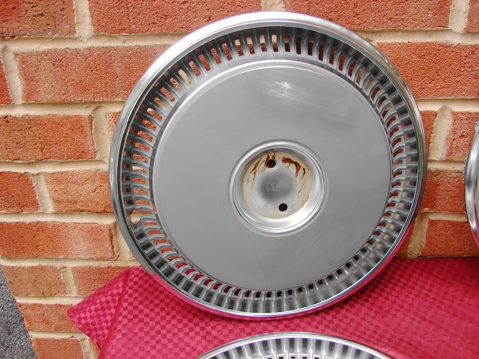 75 CHEVROLET NOVA NOS BODY COLORED NOS 14 INCH HUBCAPS GM pt # 994688 ...