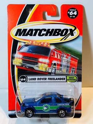 MATCHBOX MB64/66 LAND ROVER FREELANDER BLUE w/ RARE METAL BASE & FLOWER ...