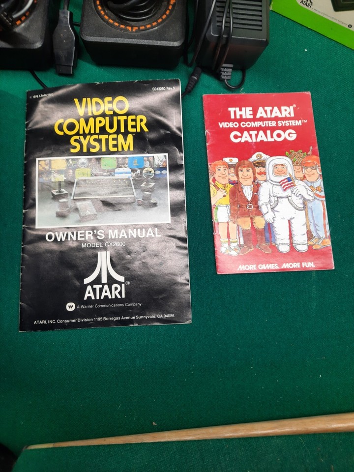 ATARI 2600 Console with 22 Games 2 Joysticks 2 Paddles Driving controller | eBay