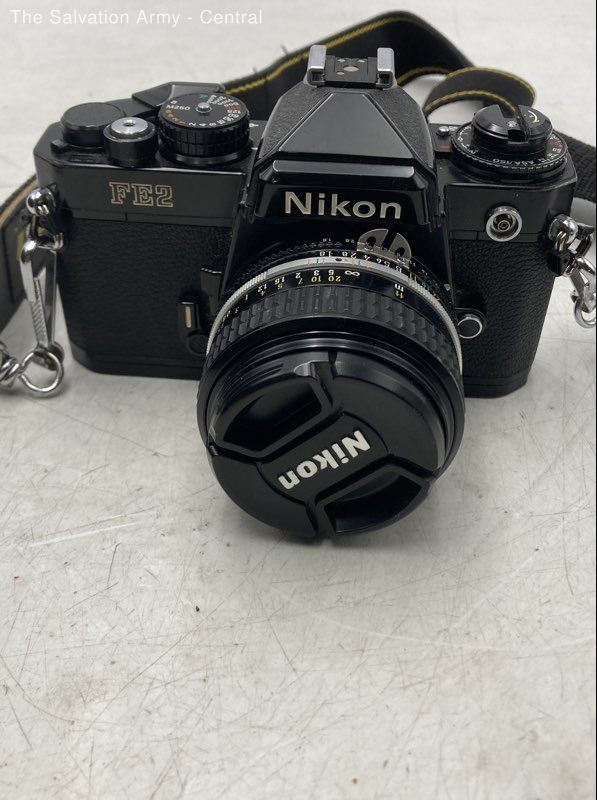 Nikon FE2 Black 35mm Auto Focus Film Camera With Strap And Accessories ...