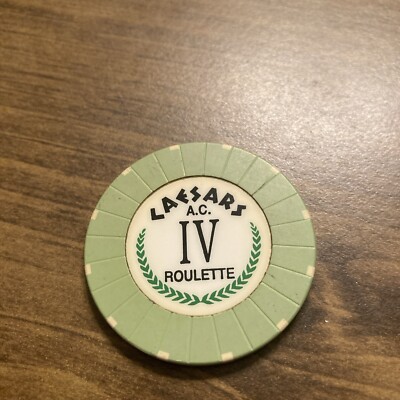 $1 caesars palace Green table roulette casino chip Atlantic City | eBay