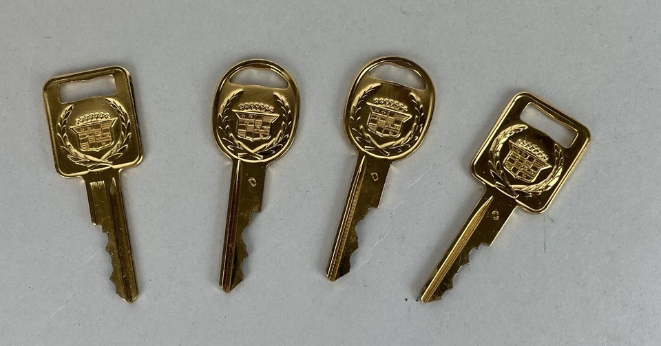4 FOUR 1980s GOLD CADILLAC IGNITION DOOR KEY EMBLEM LOGO ORNAMENT SET ...