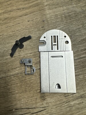Singer Merritt 2404 Sewing Machine Needle Throat Bobbin Plate Feed Dog ...