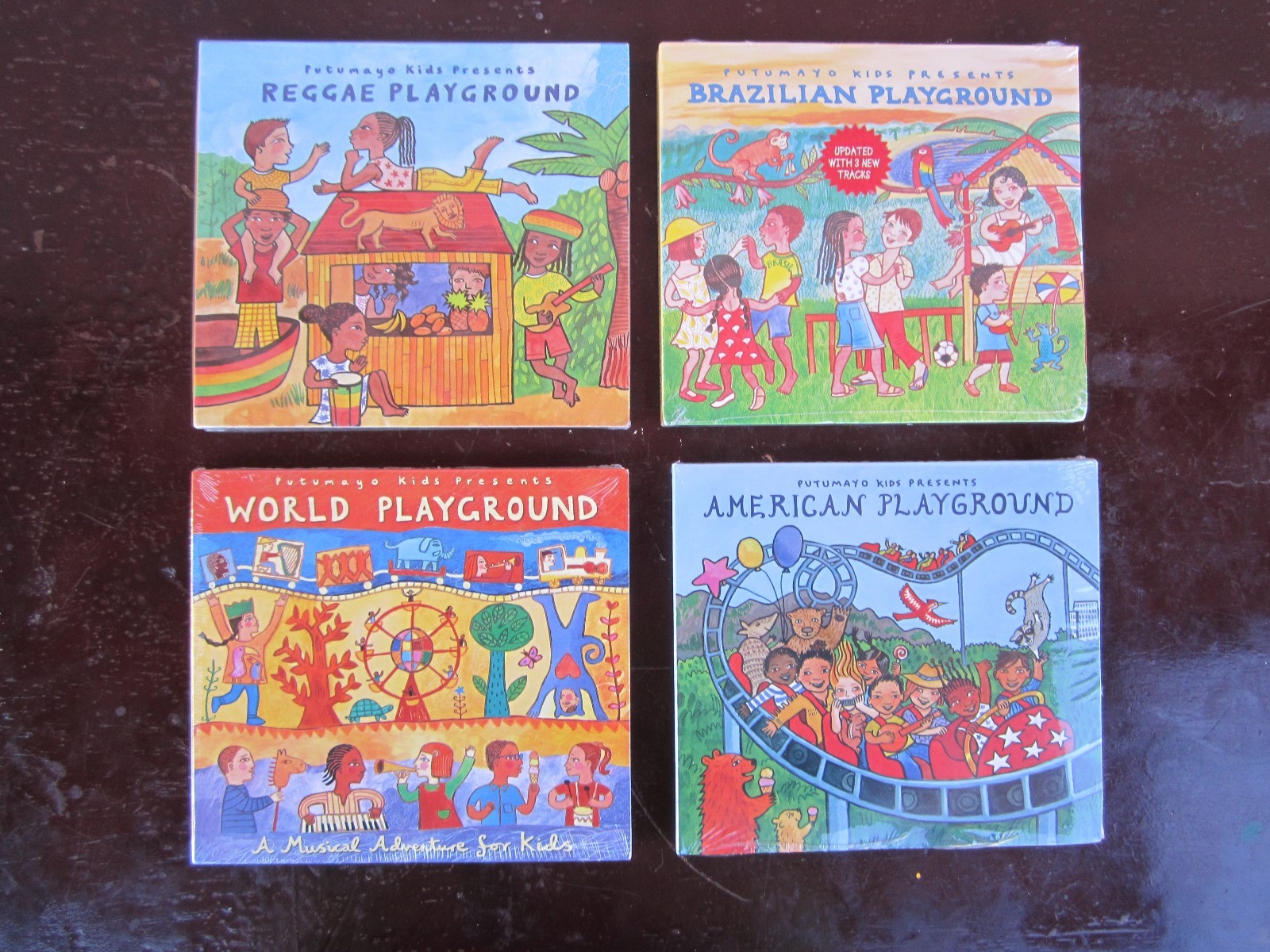 Putumayo reggae,world,american,brazil playground cd's for sale by owner ...