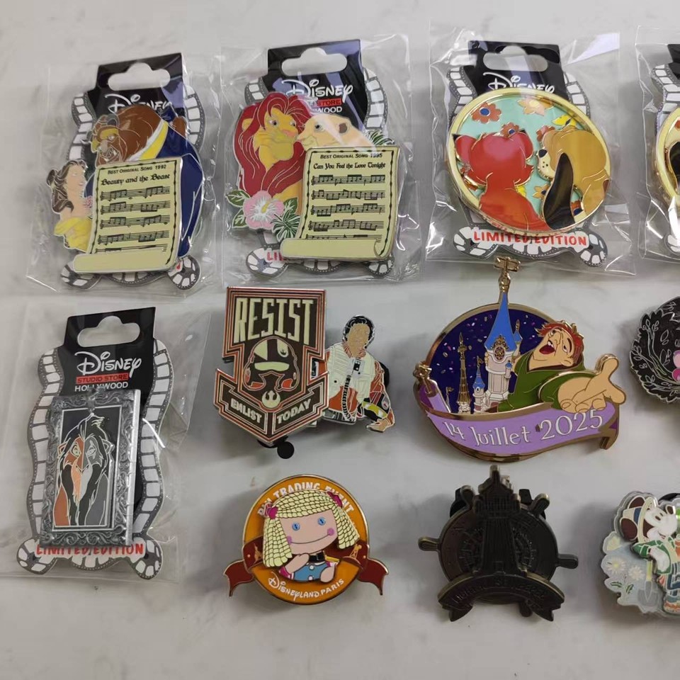 Disney exchange badges come in groups of 15 pins | eBay