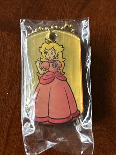 2015 super mario dog tag gold #67 princess peach Nintendo New In ...