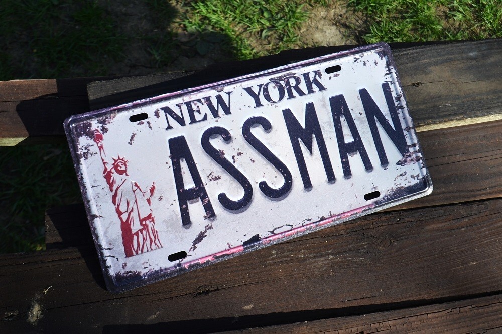 New York ASSMAN Novelty License Plate Tin Sign - Jerry Seinfeld - Cosmo ...