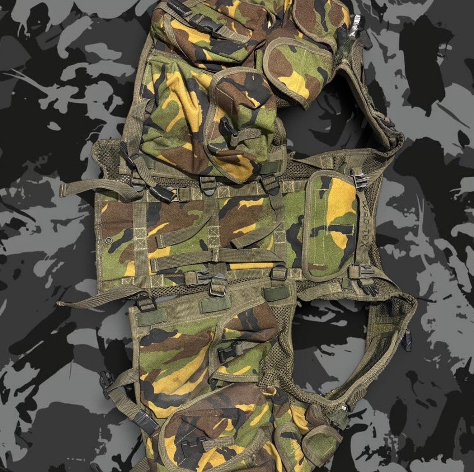 1990s surplus camo tactical vest with multiple pockets and zippers ...