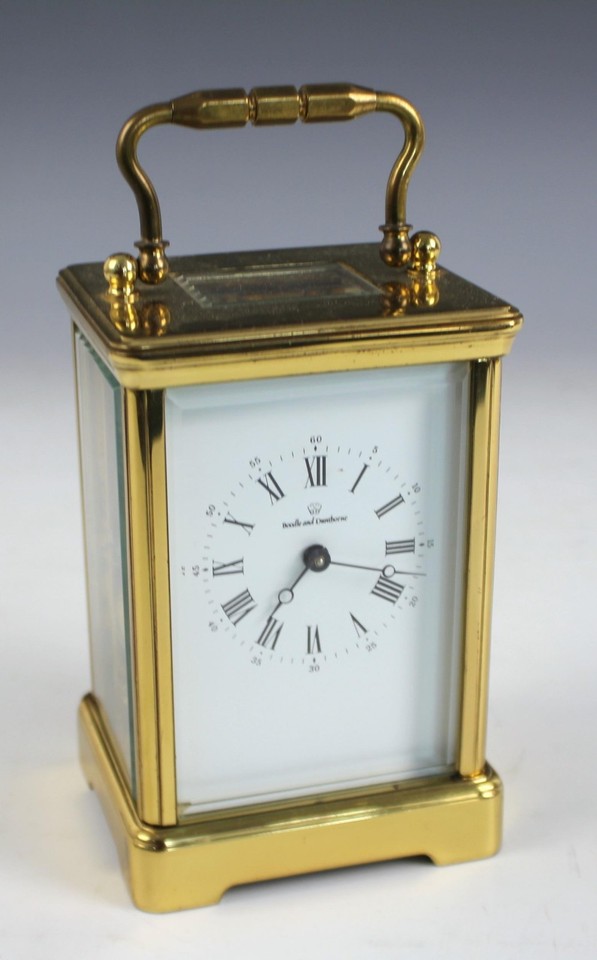 A lacquered brass Bell Striking carriage clock, retailed by Boodle ...