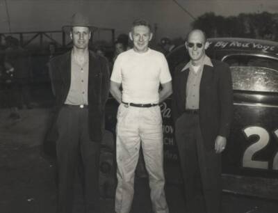 Owner Raymond Parks, mechanic Red Vogt and driver Red Byron stand i ...