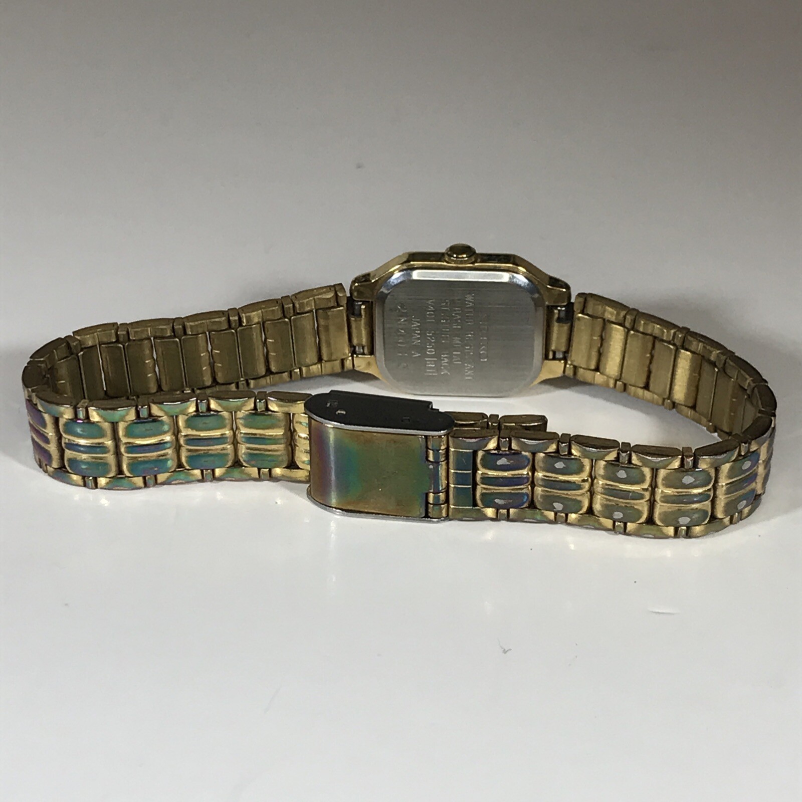 Seiko Women's Gold Tone Black Dial Rectangle Case 17mm Watch V401-5250 ...