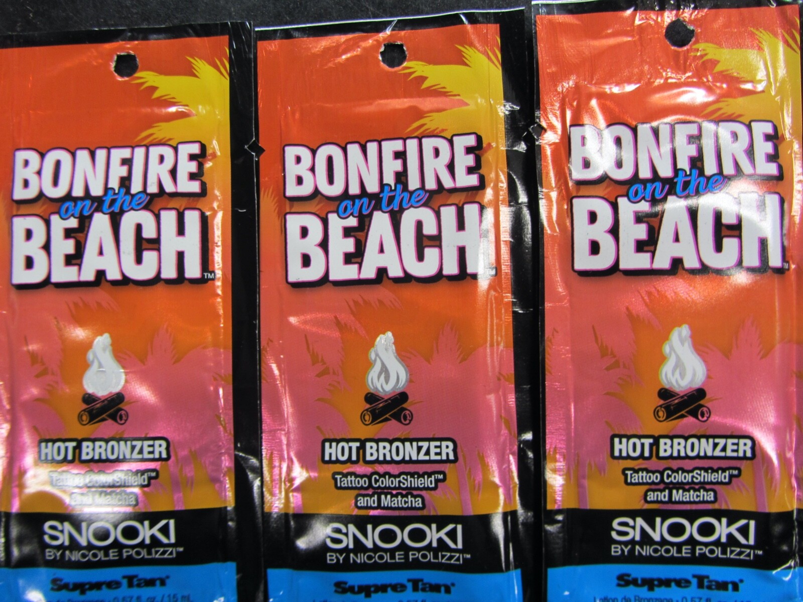 10 PACKETS SUPRE SNOOKI BONFIRE ON THE BEACH HOT TINGLE TANNING LOTION ...