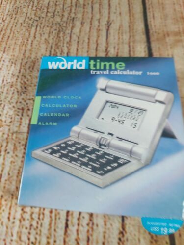 Compact WORLDTIME Travel Calculator Alarm Clock Calendar 1660 With ...