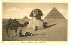 Camel Riders Bowing At Great Sphinx And Pyramids Of Giza Cairo, Egypt ...