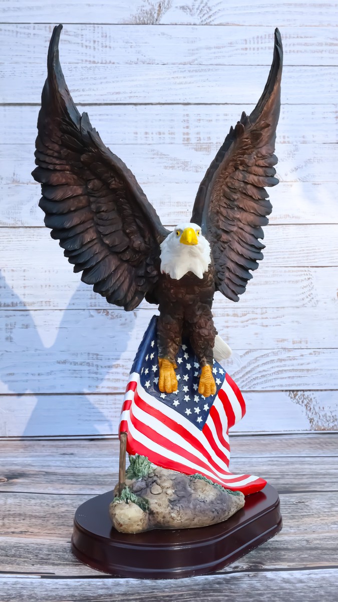 American Bald Eagle Holding Flag