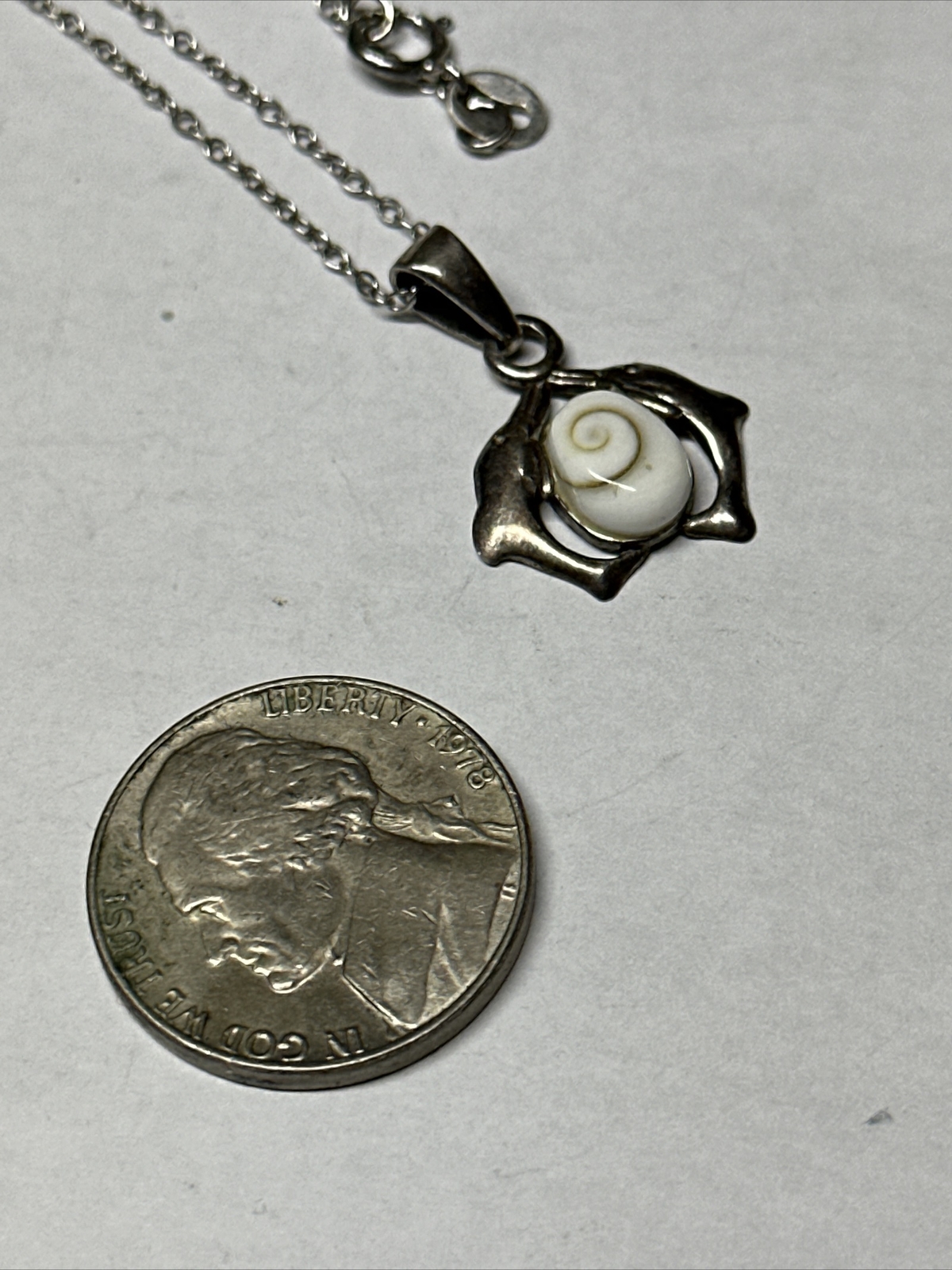 SHIVA SHELL EYE OF ST. LUCIA PENDANT WIRE WRAPPED .92… - Gem