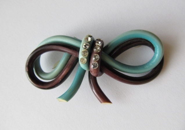 VINTAGE BAKELITE CELLULOID & RHINESTONE BOW PIN | eBay