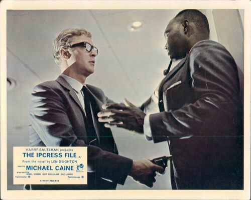 The Ipcress File Michael Caine holds gun on Thomas Baptiste original ...