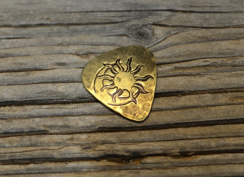Sun and Moon playable brass guitar pick | eBay