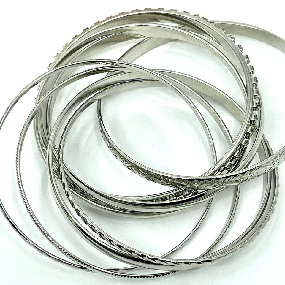 Bangle Bracelets Silver Tone Stack of 8 Connected Nice Bangle Bracelets ...