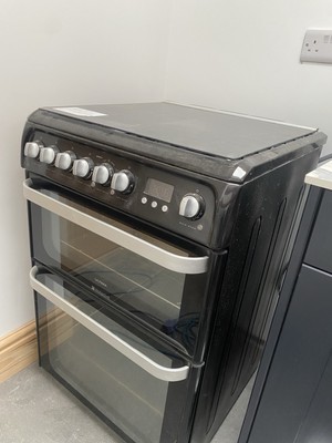 Hotpoint Ultima Dual fuel 60cm Black & Silver Cooker with glass lid ...