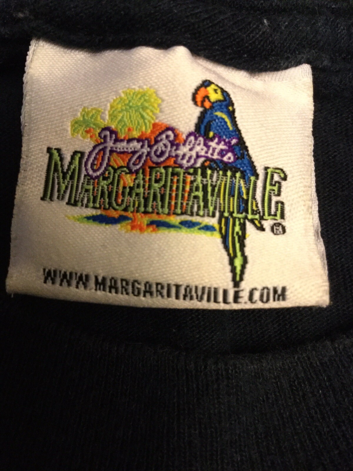 Jimmy Buffett’s Margaritaville - Cancun. Blue Shirt.… - Gem