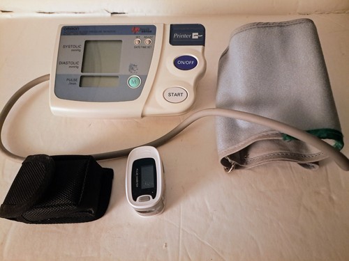 Omron Automatic Blood Pressure Monitor and Contec Finger Blood Oxygen ...
