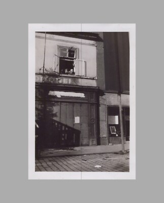 WW2 Photo Civilians Looking Out Window Store Shop Below | eBay
