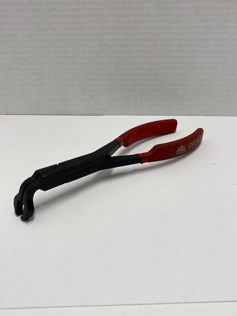 Seat belt plastic rivet removal tool - galaxygast
