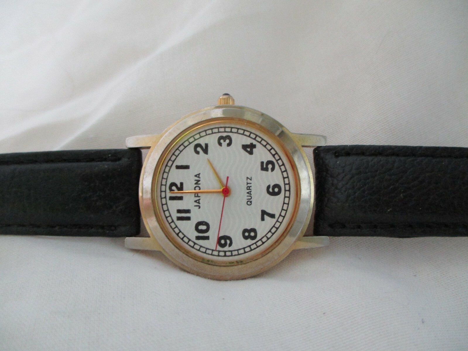 Japona Analog Wristwatch with Quartz Movement and a Buckle Band | eBay