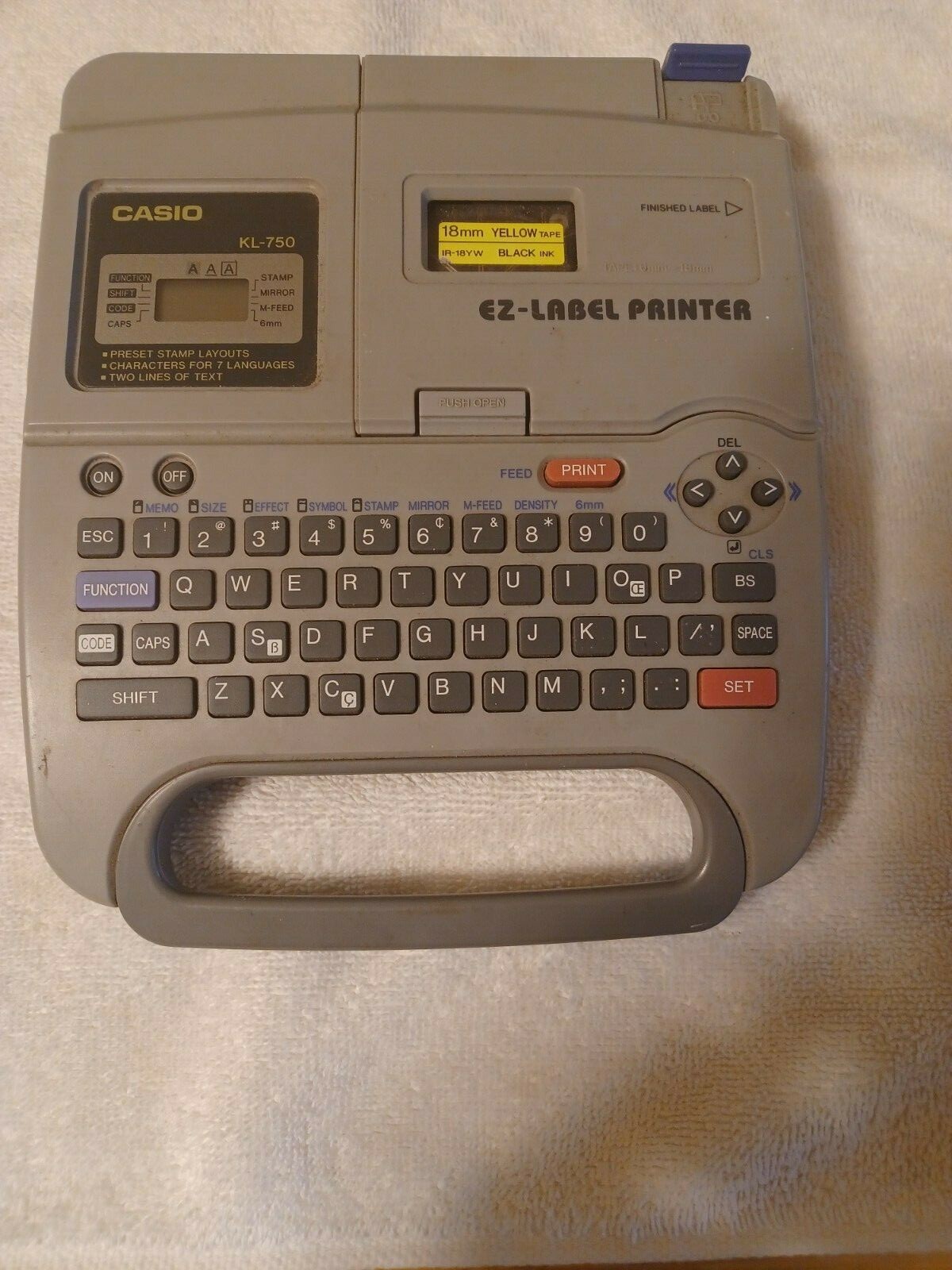Casio KL-750 EZ Label printer 18mm Yellow tape Black Ink. | eBay