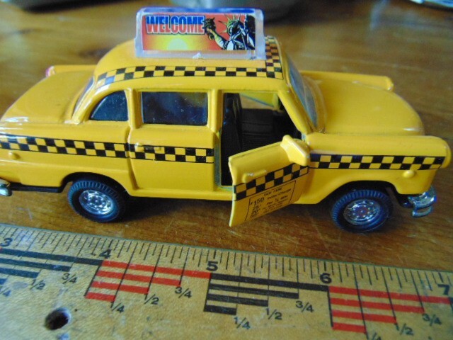 Older JL Checker cab- die cast- doors open- Made in China | eBay