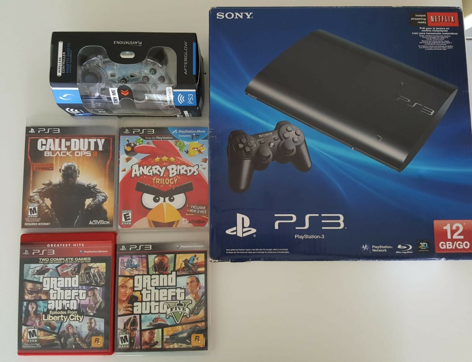 playstation 3 12 gbs console slim with extra controller and games | eBay