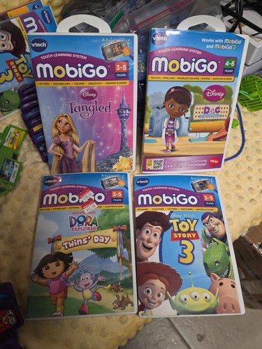 Lot of 4 MobiGo Games VTech Disney Toy Story 3 Disney Tangled Dora | eBay