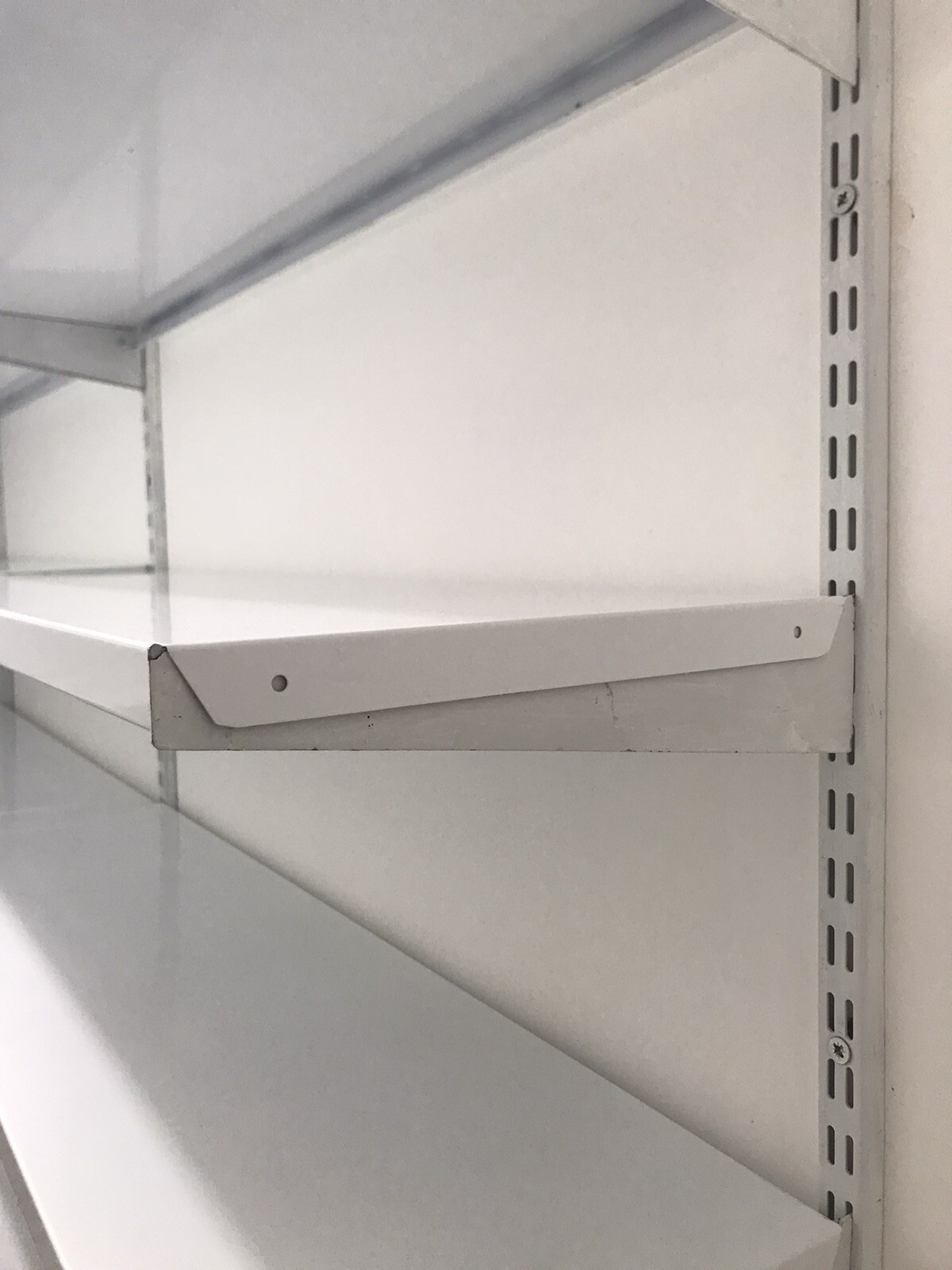 Wall shelves with twin slot uprights and brackets Adjustable shelving ...