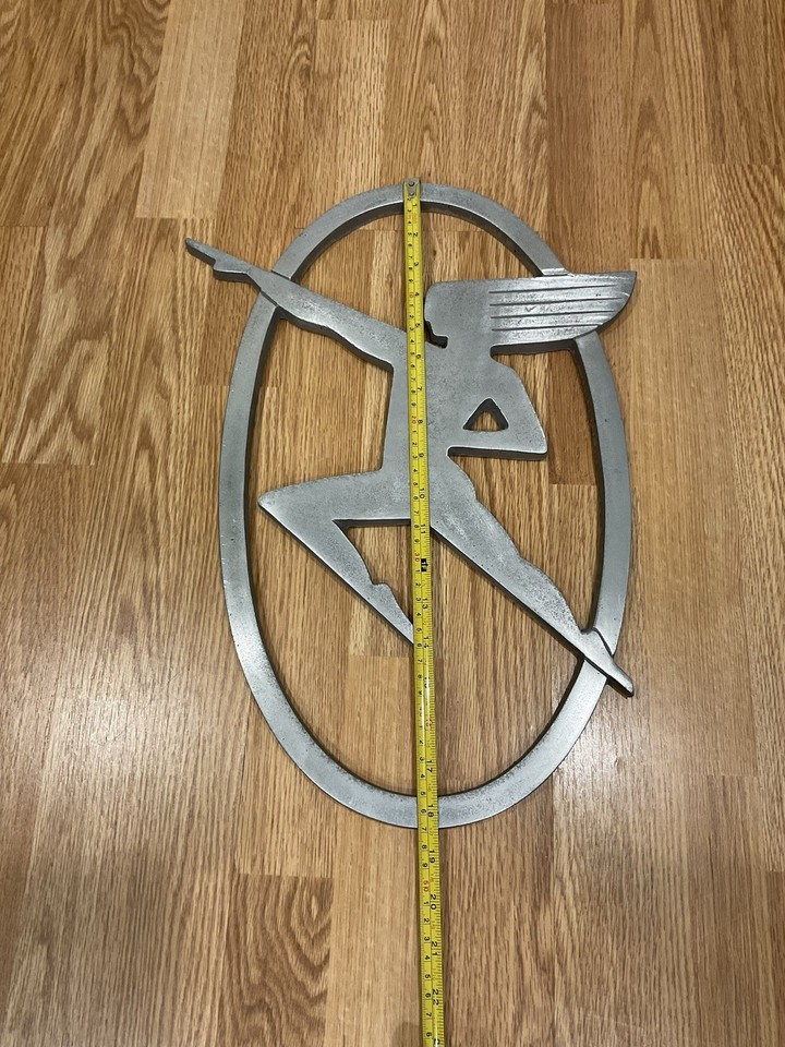 This is a reproduction Milwaukee Road Hiawatha cast aluminum logo sign ...