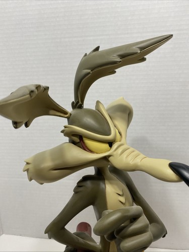 Looney Tunes Wile E Coyote Sitting on Dynamite Road Runner statue ...