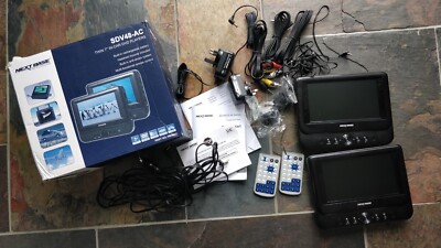 NEXTBASE SDV48-AC TWIN 7" IN-CAR PORTABLE DVD PLAYERS WITH LEADS AND ...