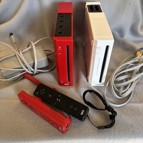 Nintendo Wii Limited Edition Console Red - RVL-001, and also a white ...