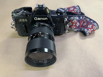 VINTAGE CANON 35MM AE-1 BLACK CAMERA W/CANON LENS FD 35-70MM 1:4 **READ ...