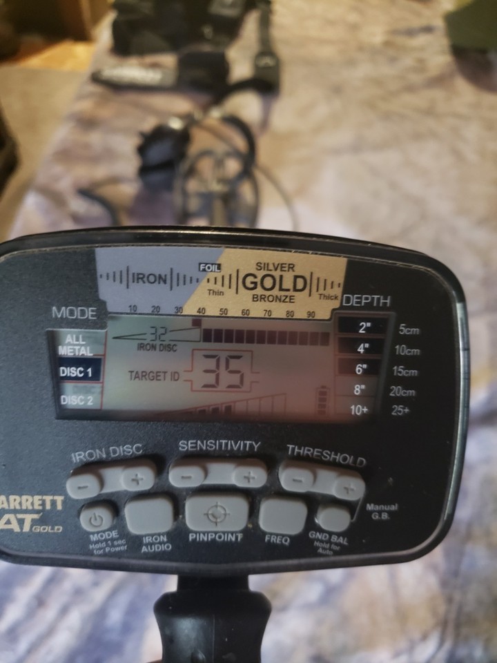 Garrett AT Gold metal detector used with Pin Pointer, Tool Belt, and ...