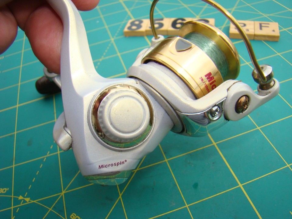 V8568 PF PFLUEGER MICROSPIN 4410 SPINNING FISHING REEL | eBay