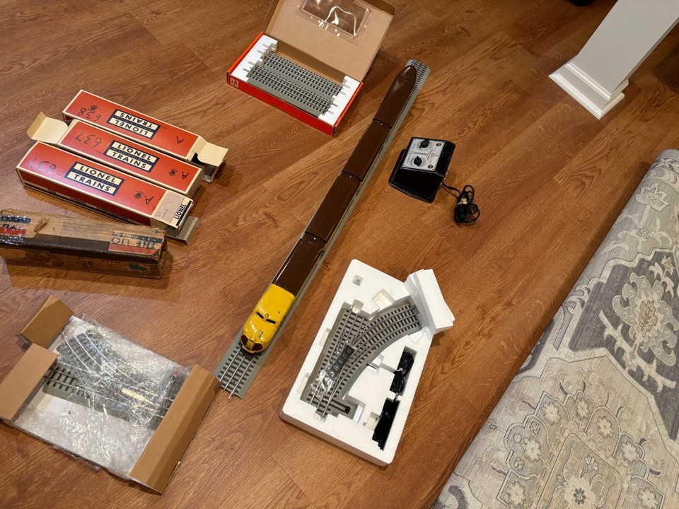 Rare pre-war Lionel train with track and transformer. Yellow and brown ...