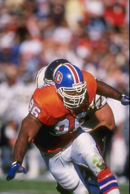 Defensive lineman Harold Hasselbach Denver Broncos stares into the- Old ...